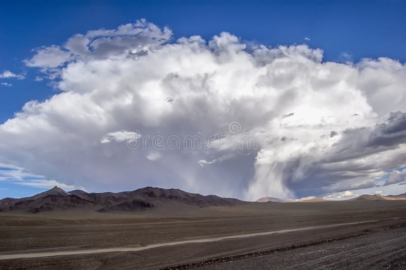 Spectacular Explosion-shaped Clouds on the Mountain in the Distance ...