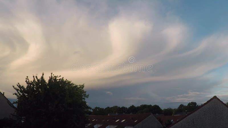 Spectacular Motion of the Anvil of a Thunderstorm at Sunset Stock ...