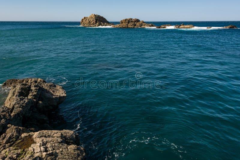 Ocean View With Evening Sun Illuminating Curvy Coastline. Stock Photo ...