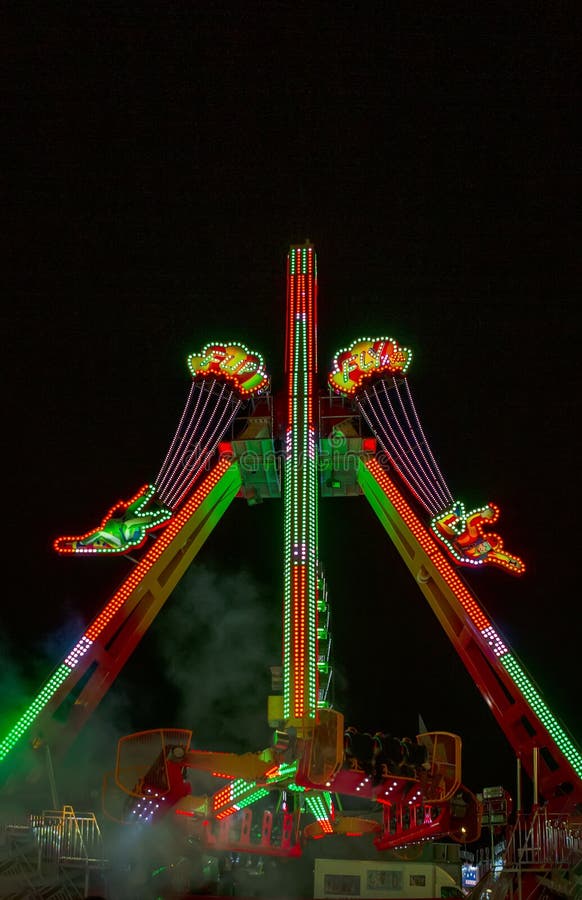 Spectacular Shot of Illuminated Fairground Ride from Below Stock Photo ...