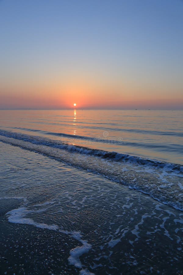 A Spectacular Sunrise Over the Sea. Stock Photo - Image of coastline ...