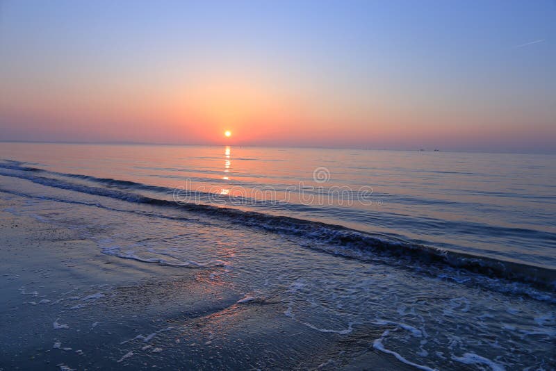 A Spectacular Sunrise Over the Sea. Stock Photo - Image of cloud ...