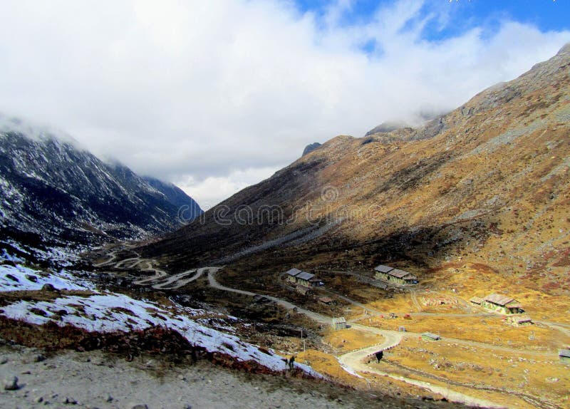 Spectacular View of a Vast Valley Surrounded by Majestic Mountains in ...
