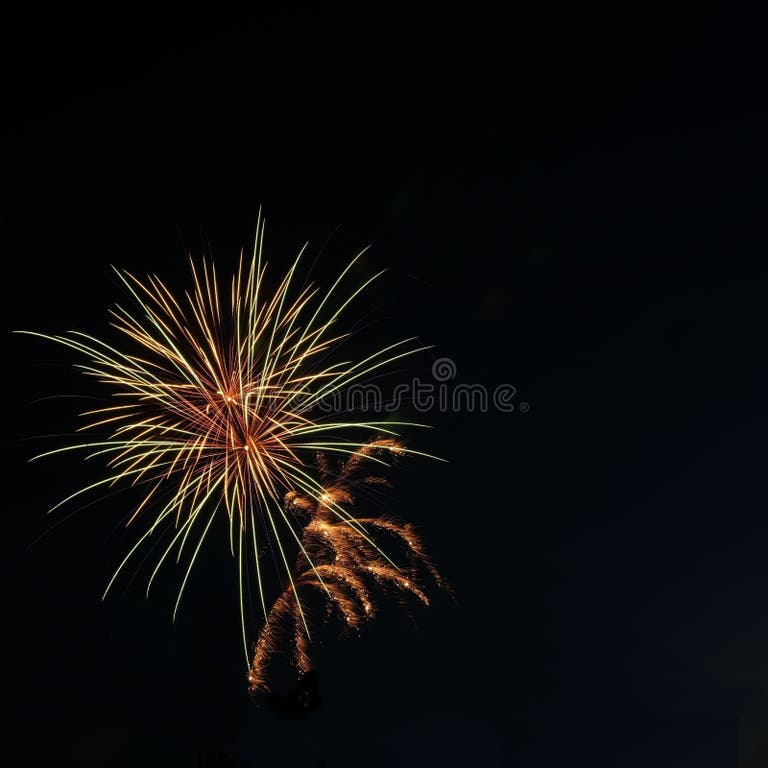 The View of Fireworks Exploding in the Dark Sky with Dark Clouds Above ...