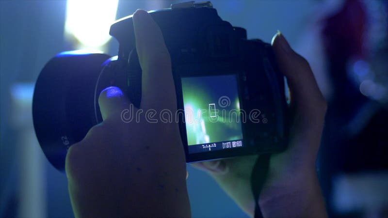 Spectator Girl Shooting on Camera Stock Photo - Image of dark, crowd ...