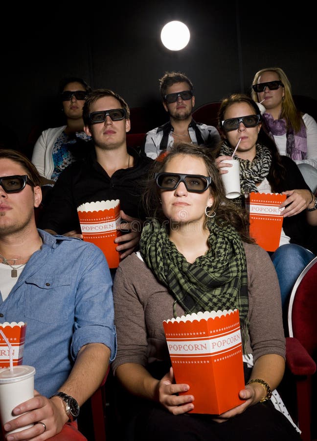 Spectators at cinema stock image. Image of film, popcorn - 21374389