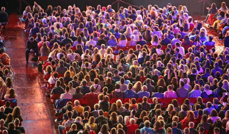 Spectators Sitting on Chairs Watching the Live Show Stock Image - Image ...