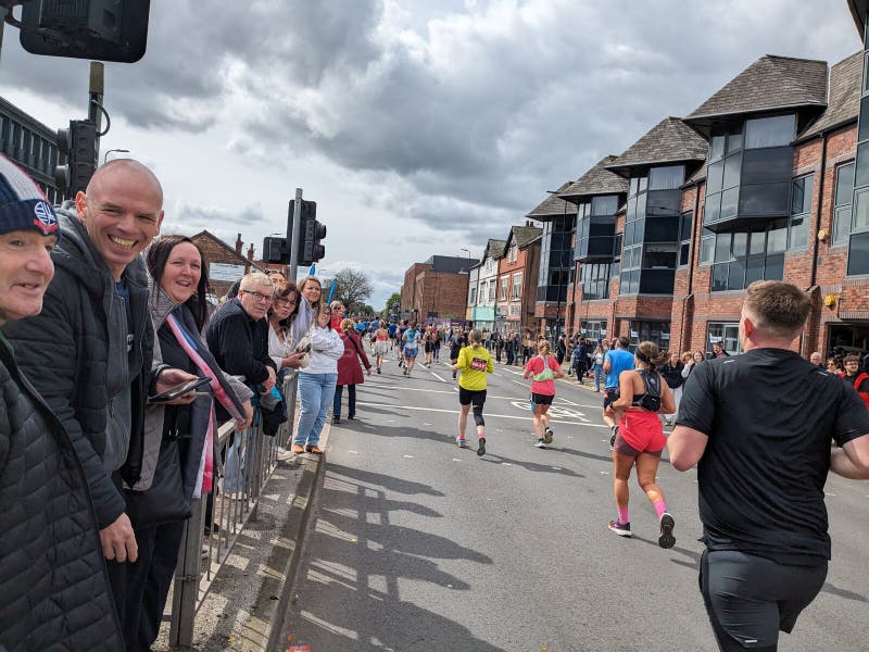 Spectators Watch Runners on the A56 on the Manchester Marathon 2024 ...