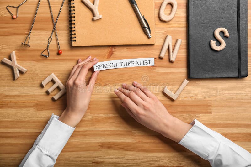 Speech Therapist at Wooden Table, Top View Stock Photo - Image of ...