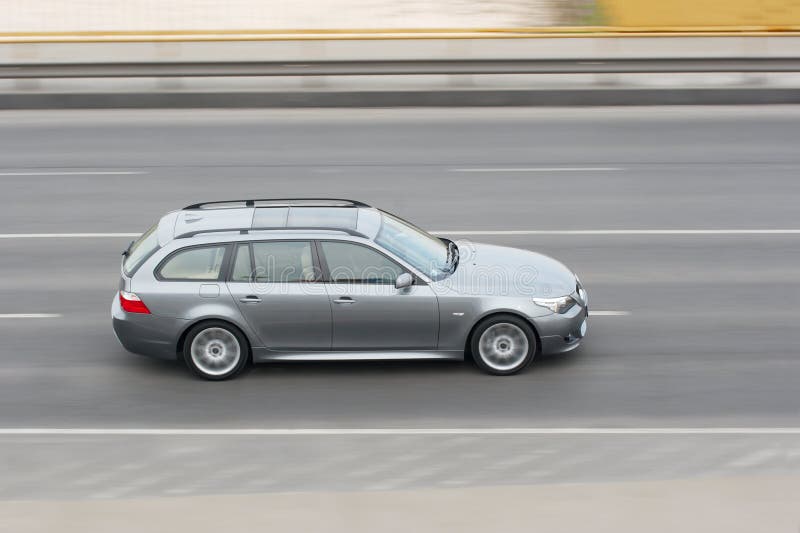 Speeding car (Mini Cooper) stock image. Image of commuting - 14508305