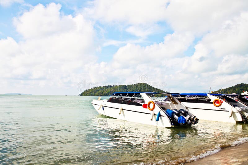 Speed Boat on Beach with Blue Sky Stock Photo - Image of green, clear ...