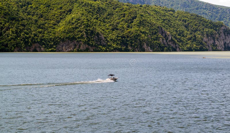 Speed boat crossing river stock photo. Image of nautical - 41936574