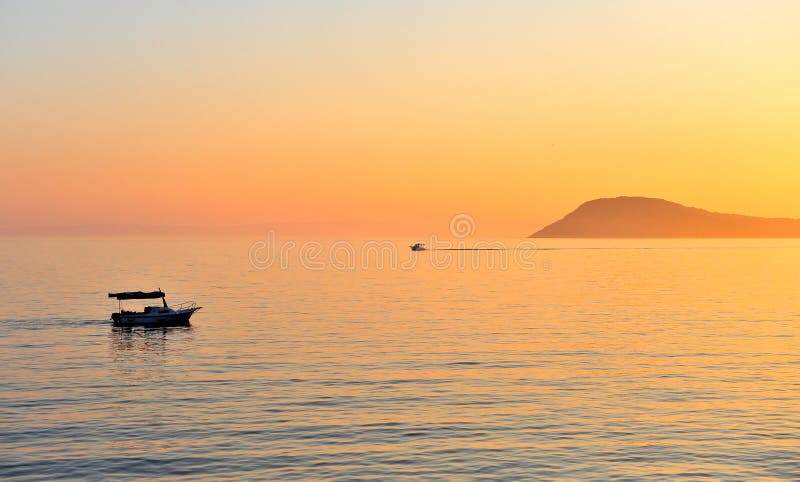 Speed boat on sunset stock image. Image of evening, water - 109424193
