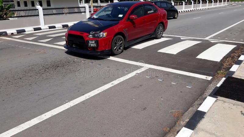 Speed bump on the street editorial stock image. Image of roads - 305342919