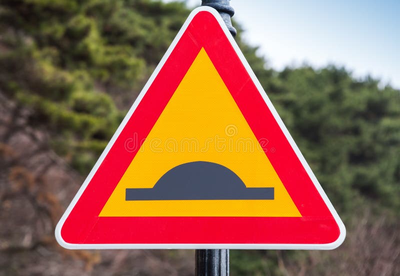 Speed Bump or Uneven Road, Traffic Sign Stock Photo - Image of close ...