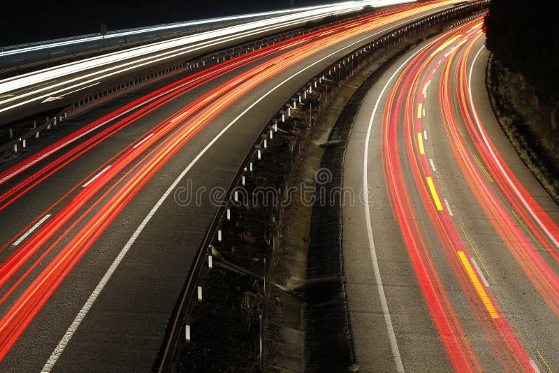 Speed cars at night stock image. Image of light, lane - 83641507
