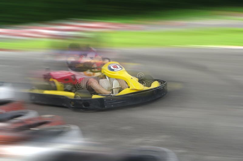 Two Cart Racers are Racing on the Grand Track Stock Image - Image of ...
