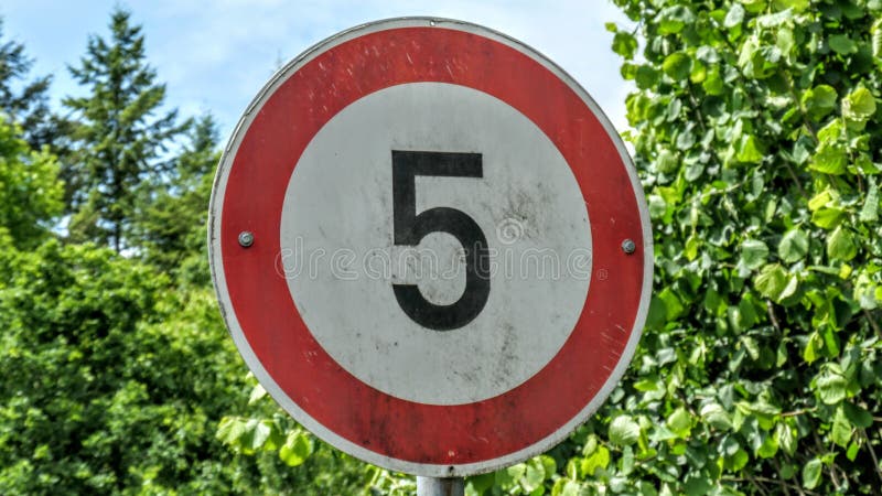 Speed Limit 5 Kilometer Per Hour Warning Sign at the Street Stock Photo ...