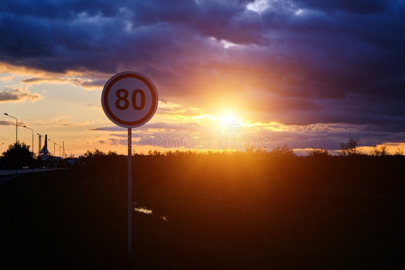 Speed Limit Sign of 80 Km H Background Bright Sunset and Clouds Stock ...