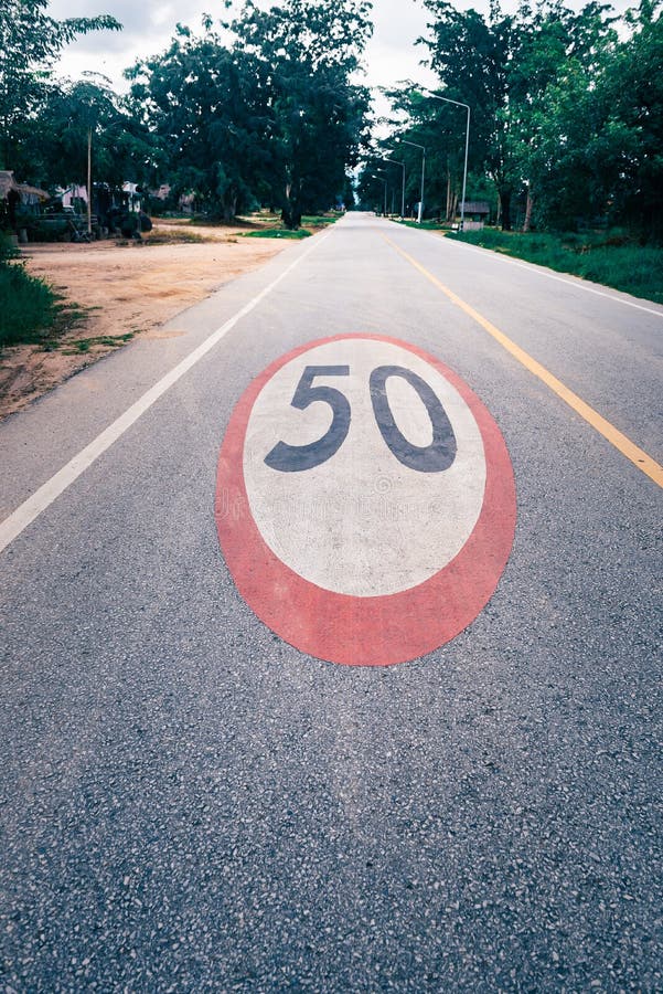 Speed Limit Sign Painted on Road Stock Photo - Image of road ...