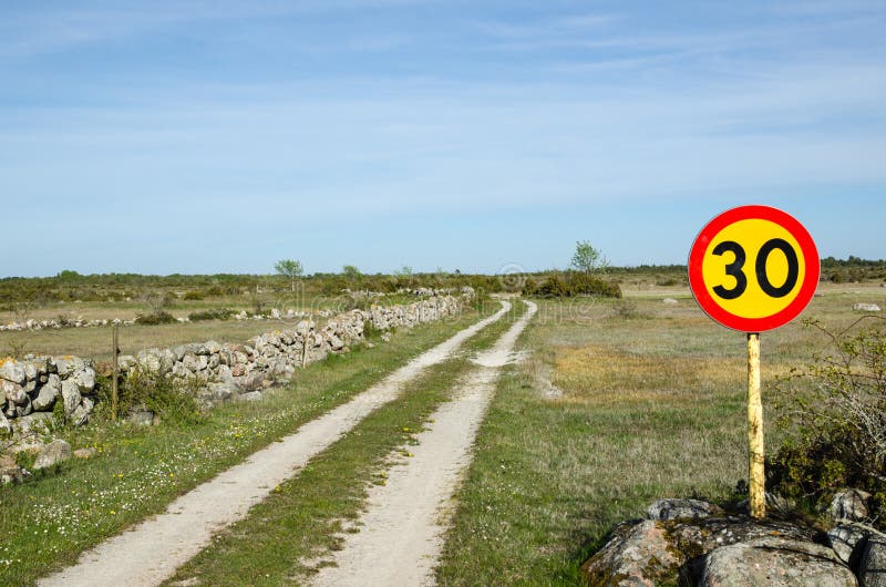 Speed Limit Sign at Rural Tracks Stock Photo - Image of road ...