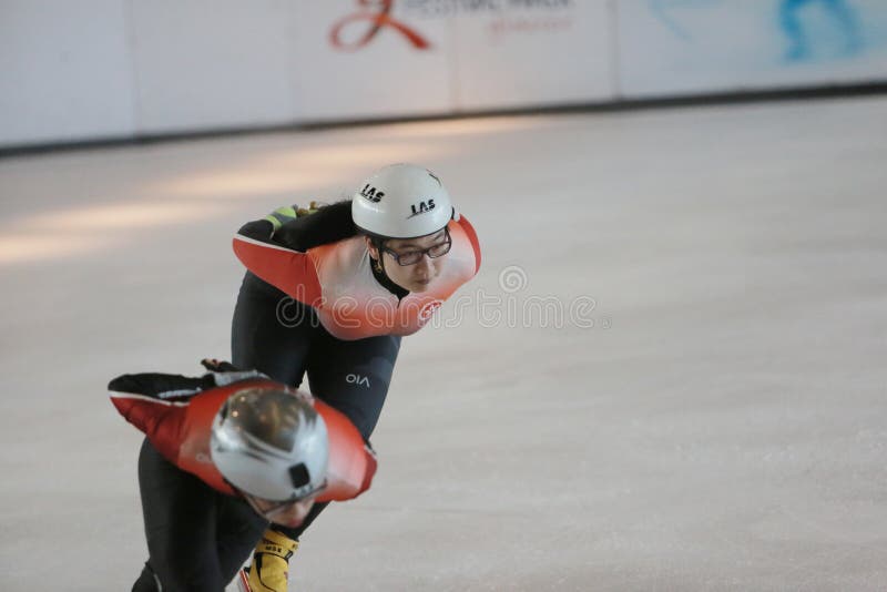 Speed Skaters during a Race Editorial Stock Image - Image of skating ...