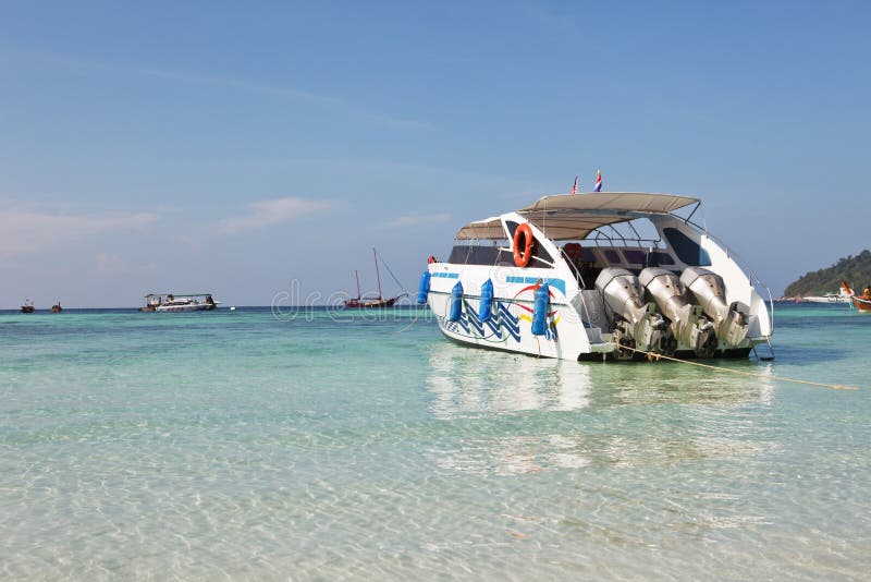 Speedboat in beach stock photo. Image of cliff, speedboat - 12986076