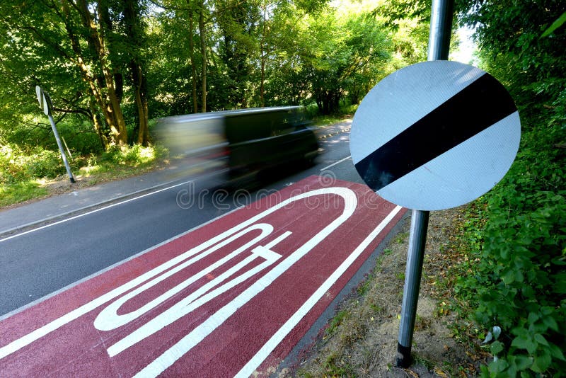 Speeding car and sign stock photo. Image of national - 139871662