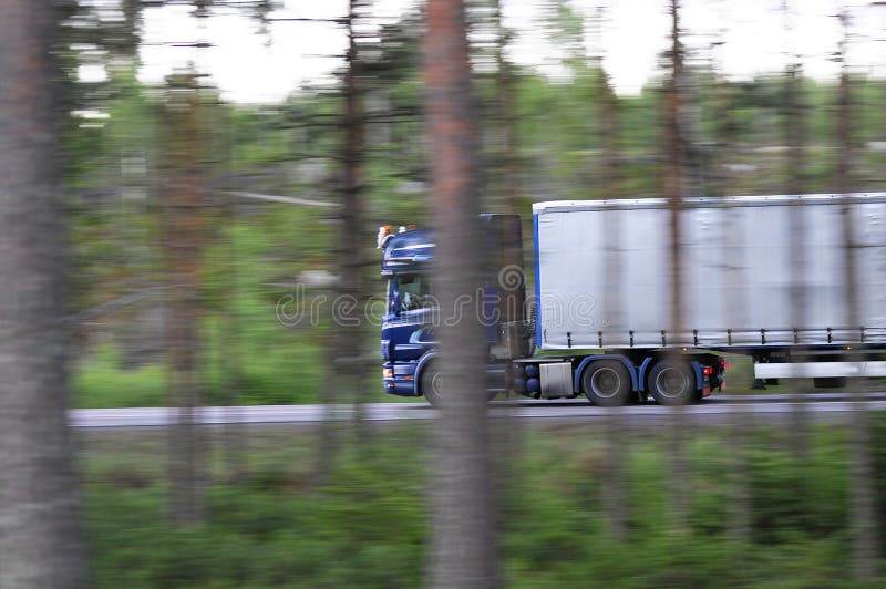Truck on the move stock photo. Image of freightliner - 22718824