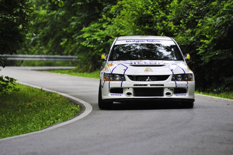 Speeding white rally car editorial photography. Image of auto - 14893762