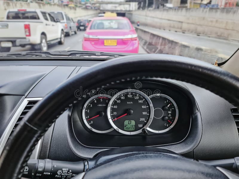 Speedometer Inside of Car Against Blurred Traffic Background Stock ...