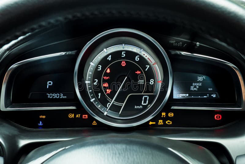 The Speedometer of a Modern Car Illuminated, a Sign of Engine Work ...