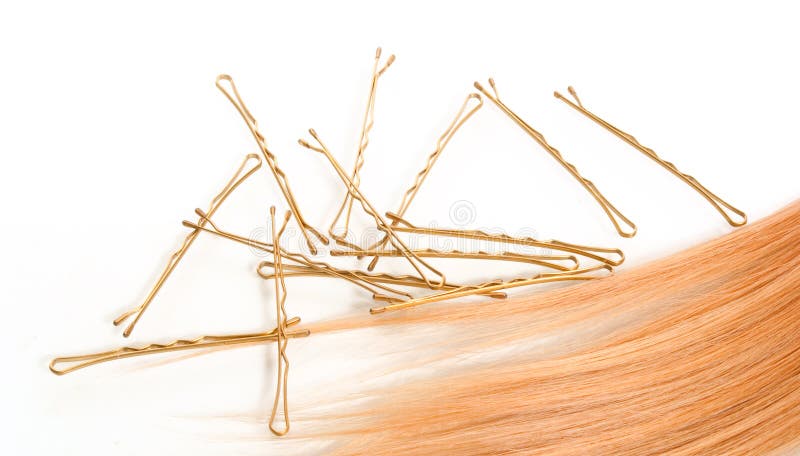 Spelden stock foto. Image of goud, gember, speld, haar - 11869674