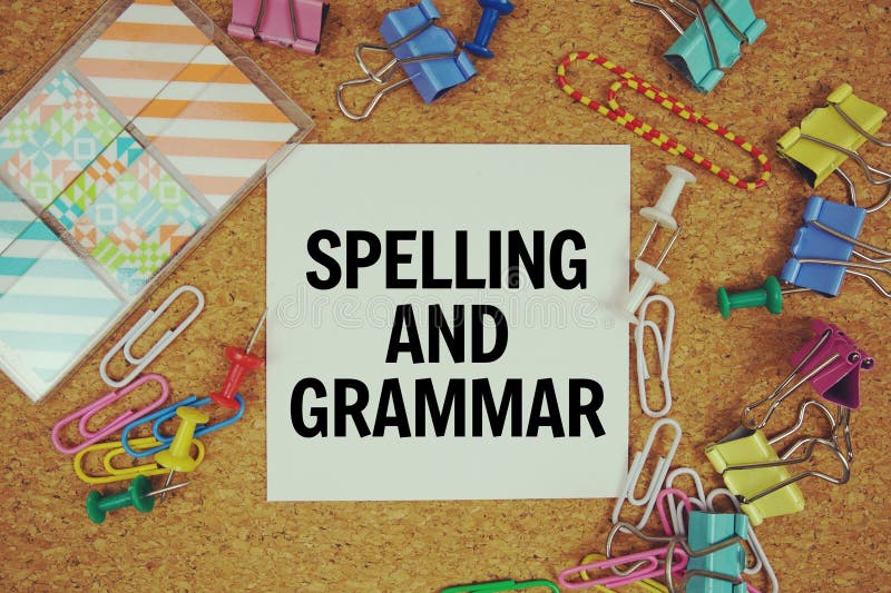 Spelling and Grammar Text on Paper Card with Stationery on Cork Board ...
