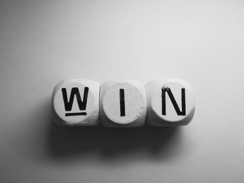 Word win spelled on dice stock image. Image of wooden - 122392041