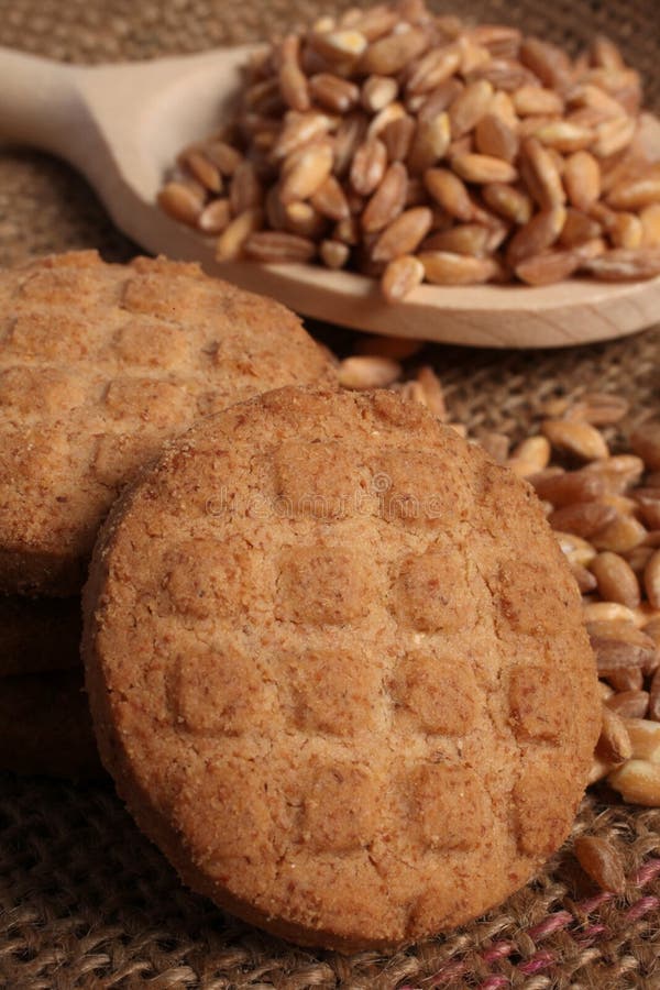 Spelt cookies and spoon stock photo. Image of natural - 18449300
