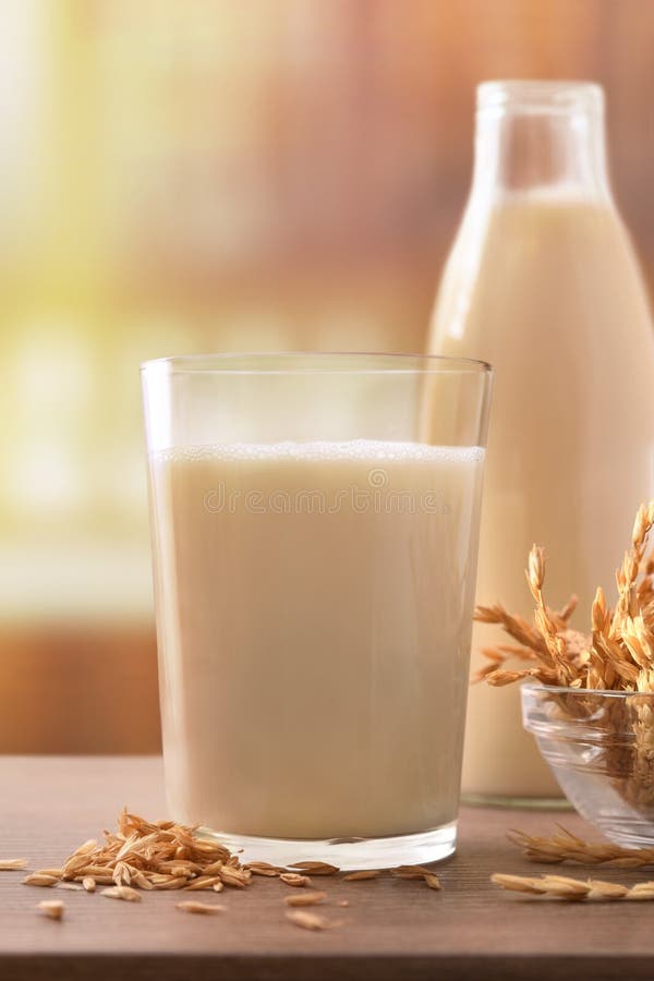 Spelt Drink in Glass in a Rustic Kitchen Vertical Stock Photo - Image ...