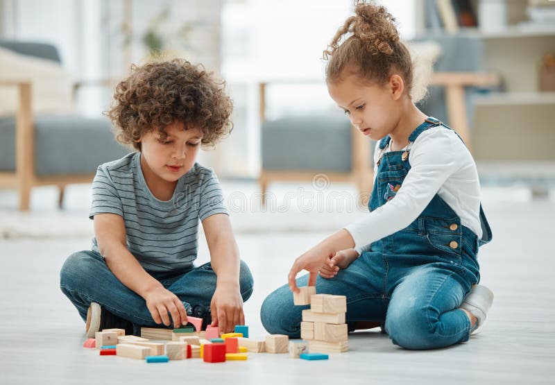 Spending Quality Time Together. Two Siblings Playing with Building ...