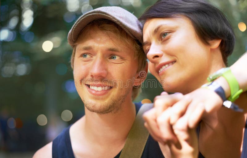 Spending Some Quality Time. a Happy Young Couple Holding Hands Outdoors ...