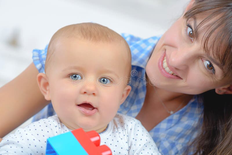 Spending time with baby stock image. Image of happy, cuddling - 89687513