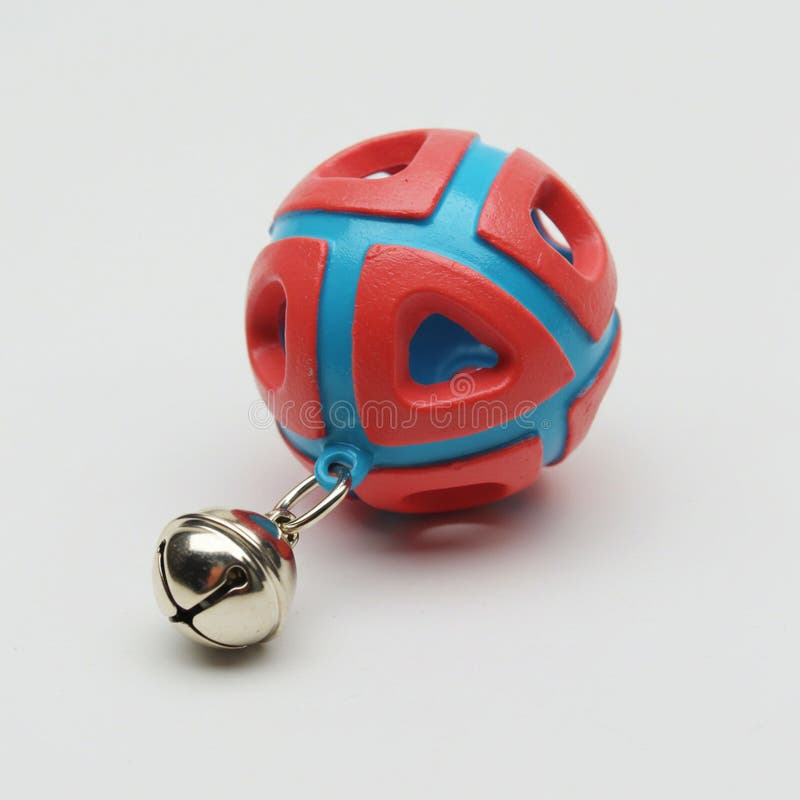 A Spherical Pet Toy with Interlocking Red and Blue Plastic Sections ...