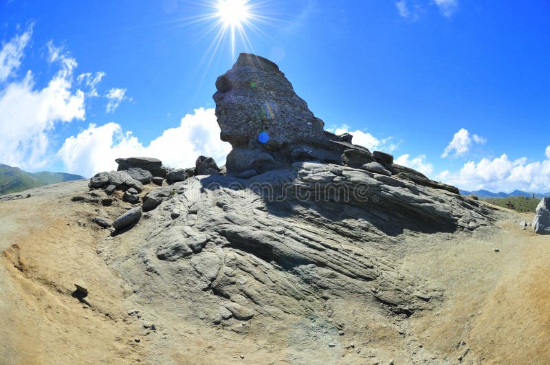 The Sphinx of Bucegi Mountains Stock Photo - Image of mountain, clouds ...