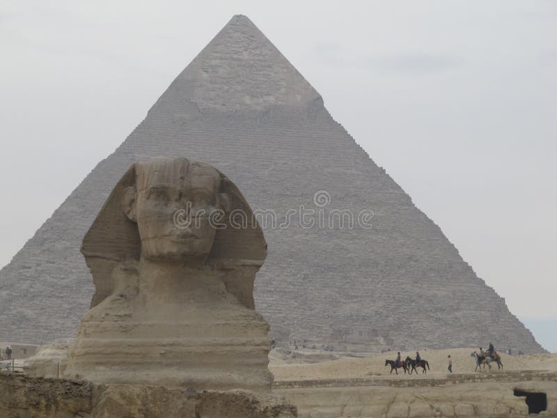 Sphinx in Front of Pyramid in Egypt. Giza Pyramid Complex Stock Image ...
