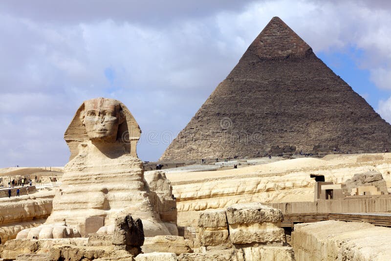 Sphinx and pyramid stock photo. Image of archeology, rock - 14214532