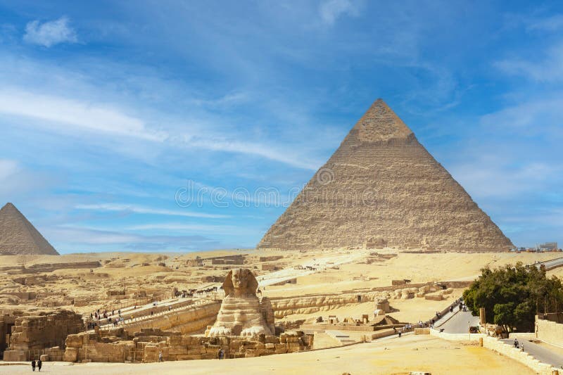 The Sphinx and Pyramid Against the Background of a Beautiful Blue Sky ...
