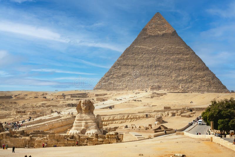 The Sphinx and Pyramid Against the Background of a Beautiful Blue Sky ...