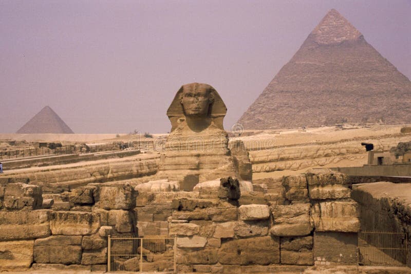 Sphinx and pyramid Cairo stock photo. Image of limestone - 427190