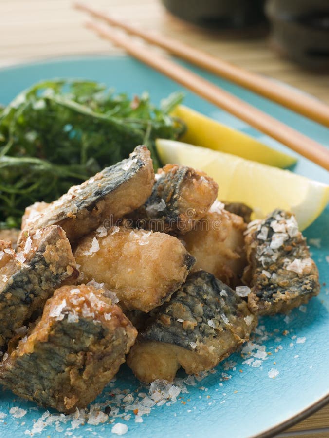 Spiced Fried Mackerel with Lemon Stock Photo - Image of fishes, lemons ...