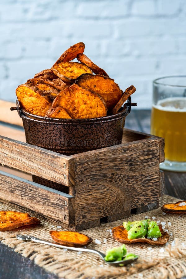 Spiced sweet potato chips stock photo. Image of dish - 202081436