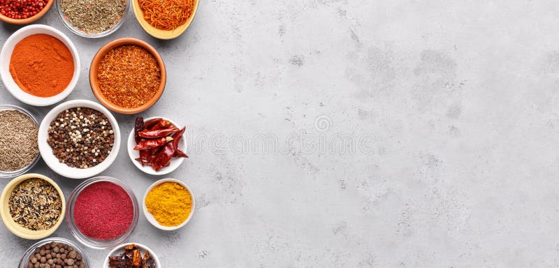 Spices and Condiments in Bowls on Grey Background Stock Photo - Image ...